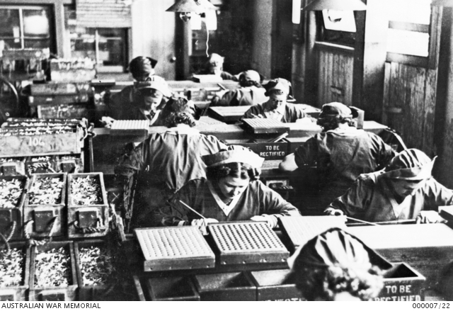 SMALL ARMS AMMUNITION FACTORY. FEMALE INSPECTORS WORKING ON .303 ...