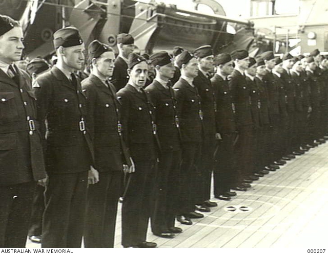 Members of No. 10 Squadron RAAF, waiting for inspection after embarking ...