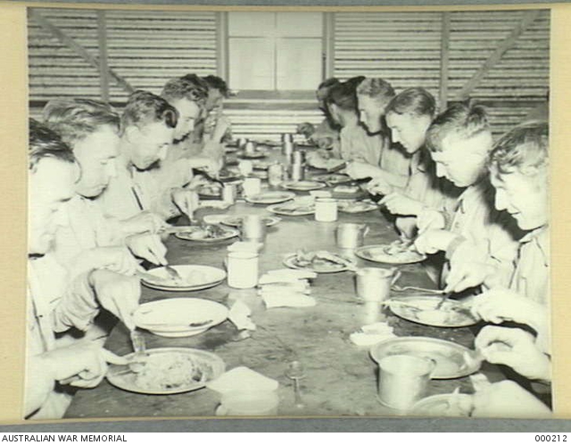 PUCKAPUNYAL - LUNCH TIME IN ONE OF THE COMFORTABLE MESS HUTS HUTS FOR A ...