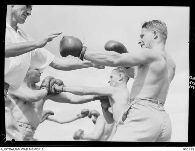 TEACHING A STRAIGHT LEFT DURING BOXING TRAINING AT THE SHOWGROUNDS. THE ...