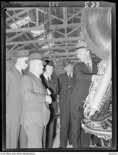 MR. LATHAM (TECHNICAL ADVISOR) POINTS OUT FEATURES OF BRISTOL BEAUFORT ...