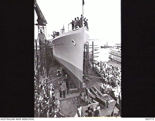 THE RAN SLOOP HMAS WARREGO RECEIVING A BLESSING DURING THE LAUNCHING ...