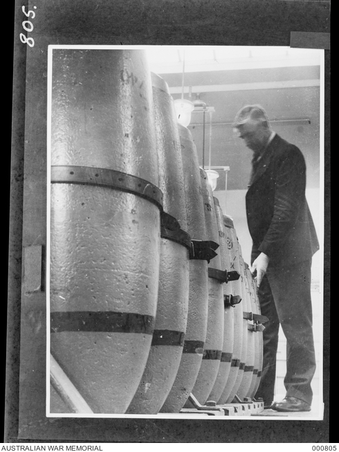 250 LB AERIAL BOMBS FILLED AND READY FOR STORING. MUNITIONS. AMMUNITION ...
