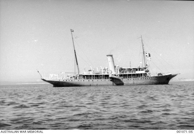 The Naval Examination Service vessel HMAS Akuna hove to on station in ...