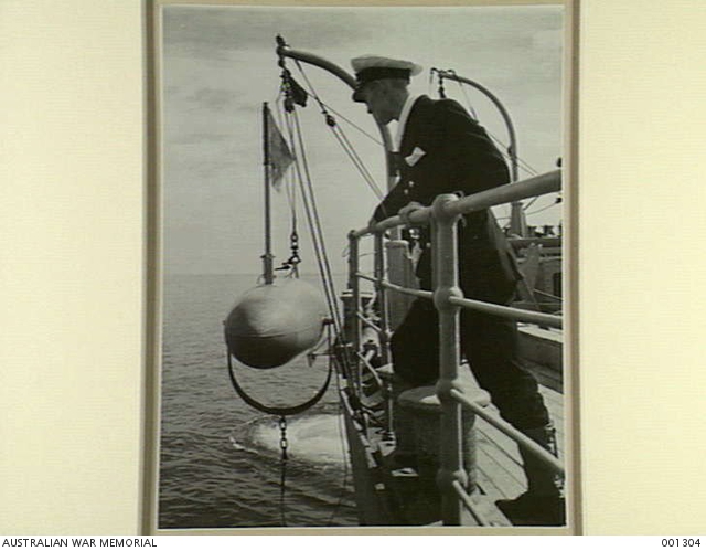 MINE SWEEPING. "LOWER AWAY" THE FRENCH FLOAT WITH ITS MARKING FLAG IS ...