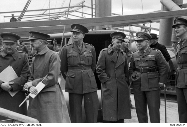 A group of Australian Army Officers waiting on the wharf during the ...
