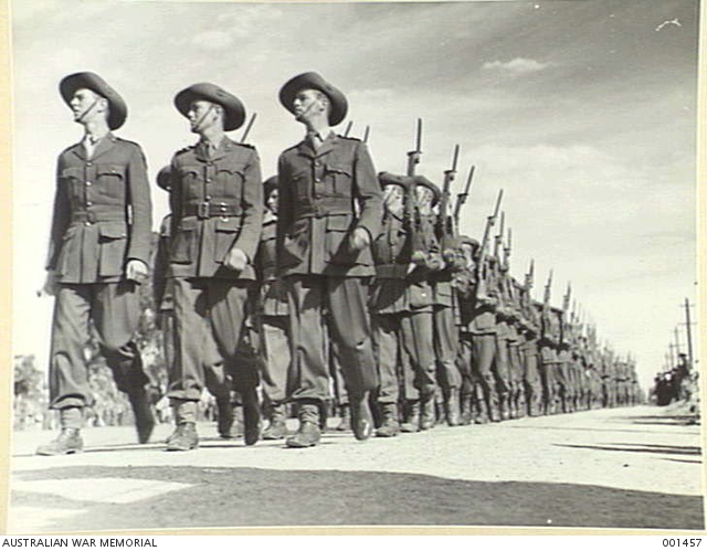 6TH DIVISION A.I.F. TROOPS MARCH PAST AT PUCKAPUNYAL REVIEW. (NEGATIVE ...