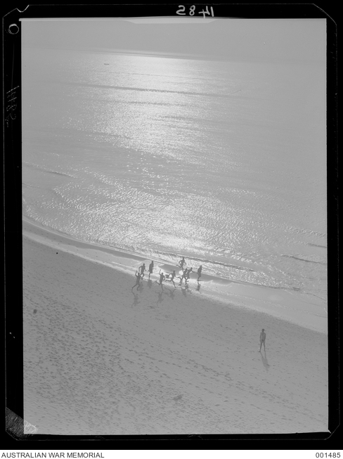 ASCALON BEACH - AFTER AN INVIGORATING SWIM TROOPS TAKE A RUN ALONG ...