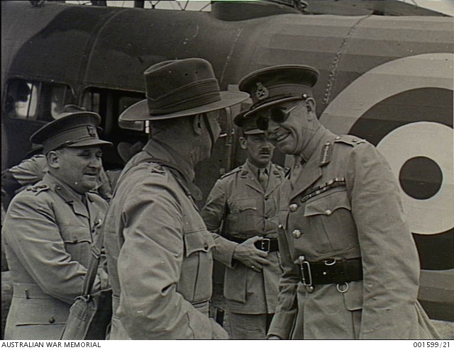 Standing beside an aircraft at the Gaza aerodrome. Left to right ...