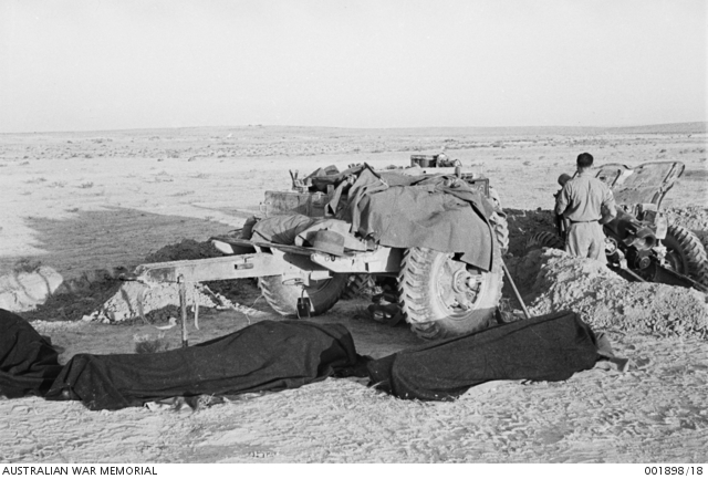 A 4.5 inch Howitzer (right) of the 2/1st Field Regiment RAA and its ...