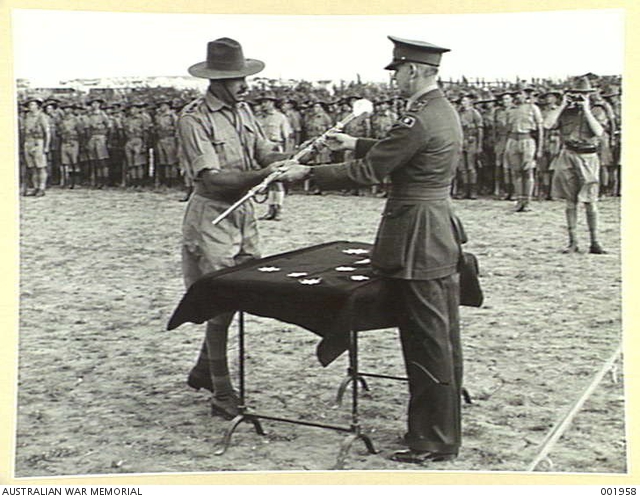 General I. G. Mackay presents a Bandmaster Stick, donated by Alderman S ...