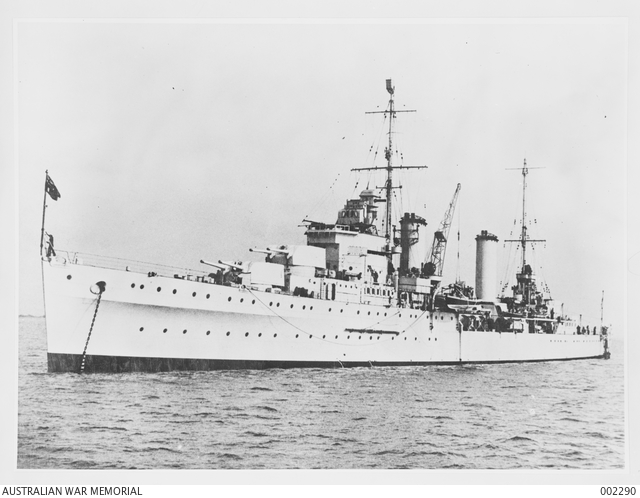 The Australian cruiser HMAS Sydney at anchor in the harbour following ...
