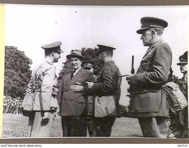 LEFT TO RIGHT: H. REID, OF SYDNEY, MR S.M. BRUCE, CAPT. COLE, AND ...