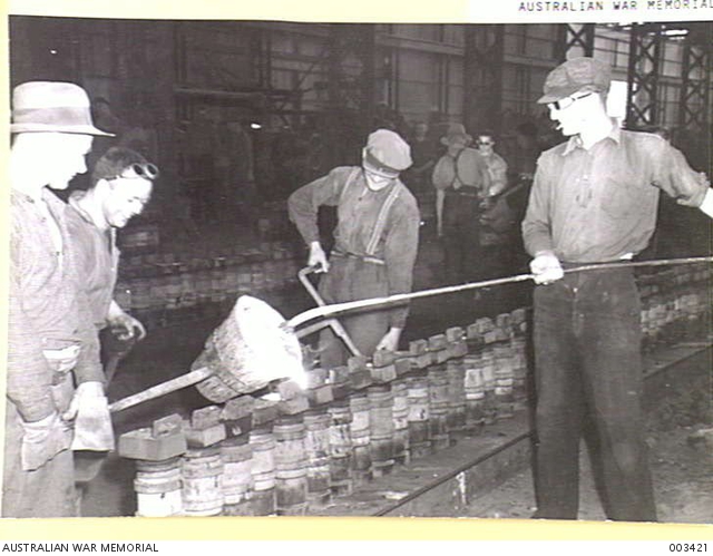 POURING CAST STEEL INTO MORTAR BOMB MOULDS. (NEGATIVE BY CRANSTONE ...