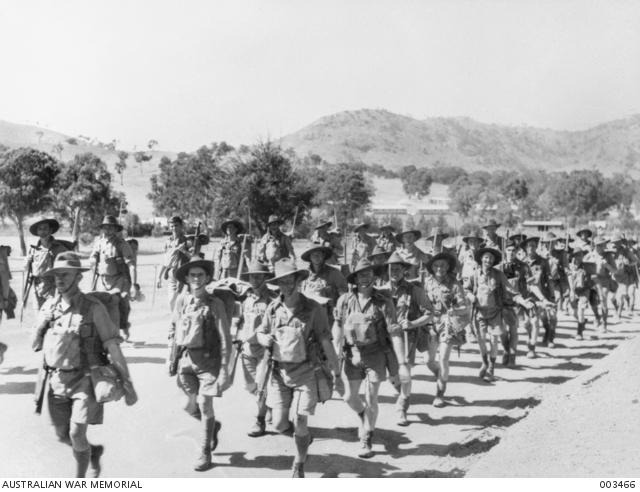 SEYMOUR - MEN OF THE 2/2 PIONEERS SWING ALONG THE ROAD DURING A ROUTE ...