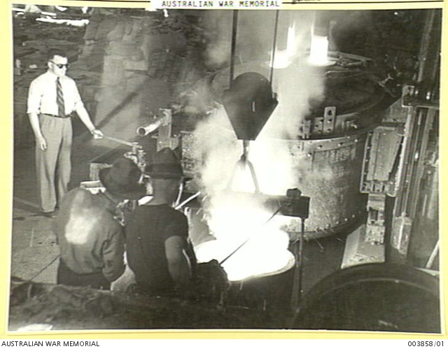 MAKING 10-LB. BOMBS: THE FURNACE IN WHICH THE METAL IS HEATED ...