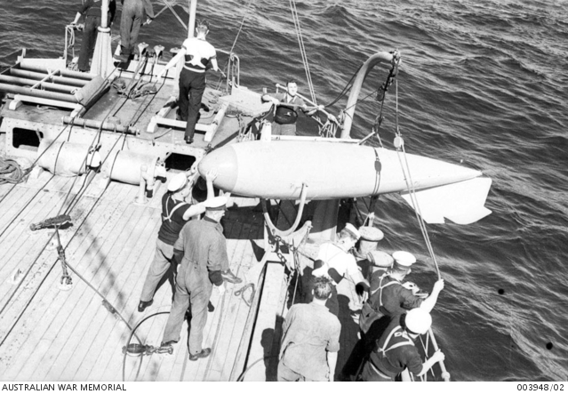 The Oreposa float being hauled aboard the Auxiliary Minesweeper, HMAS ...