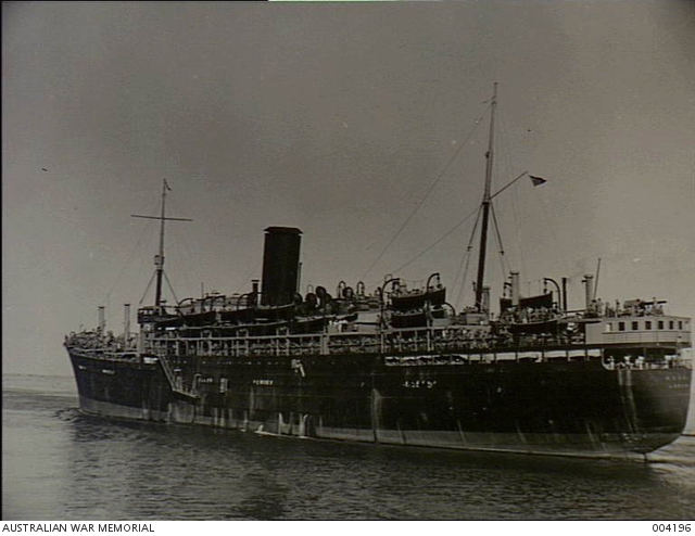 Troop transport ship SS Rhona sailing along the canal carrying men of ...