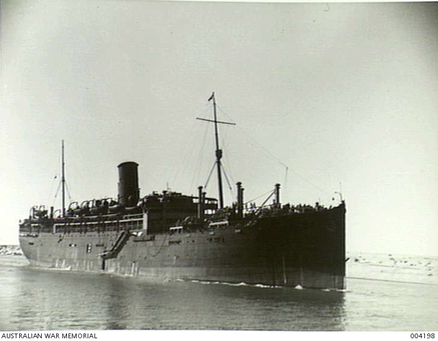 SUEZ CANAL - NEAR EL KANTARA. THE TROOP TRANSPORT SHIP "RHONA" PASSING ...