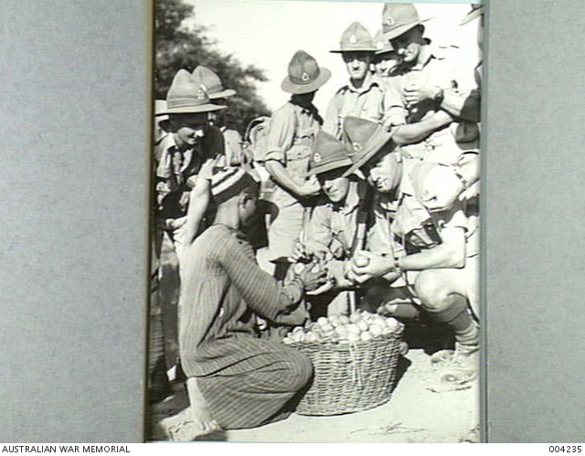 MAADI ROAD, EGYPT. NEW ZEALAND TROOPS HALT FOR A SPELL DURING A MARCH ...