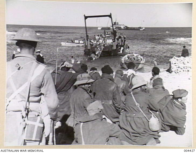 SIDI BARRANI - A GROUP OF ITALIAN PRISONERS WATCH A UNIT OF BRITISH ...
