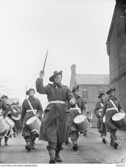 A.I.F. AT THEIR ENGLISH QUARTERS: AN AUSTRALIAN DRUMS MAJOR BUSY ...