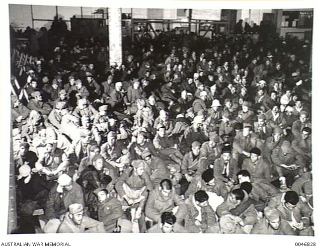 HAIFA - 1000 PRISONERS (ITALIAN) SITTING DOWN ON THE WHARF AFTER THEIR ...