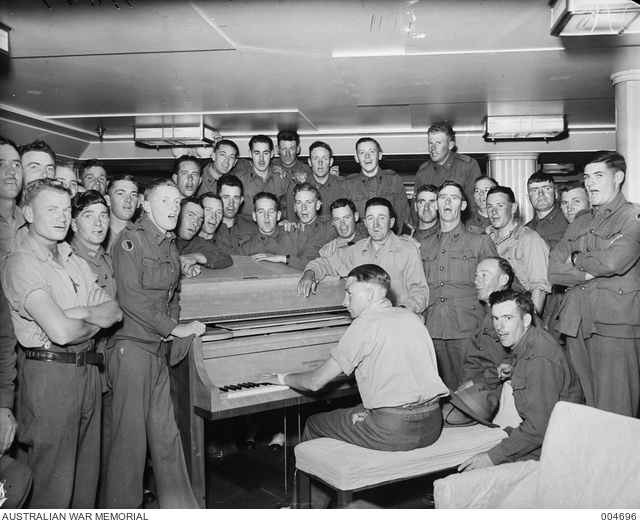 SYDNEY EMBARKATION "I" - TROOPS HAVE A SING-SONG AROUND THE PIANO. ARMY ...
