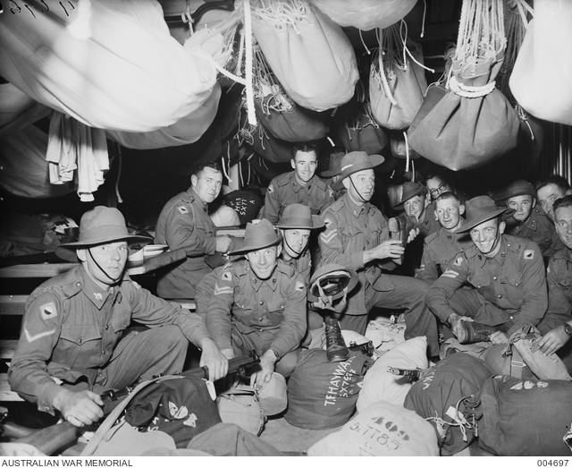 SYDNEY EMBARKATION "I" - TROOPS SORT OUT GEAR AFTER SLINGING THEIR ...
