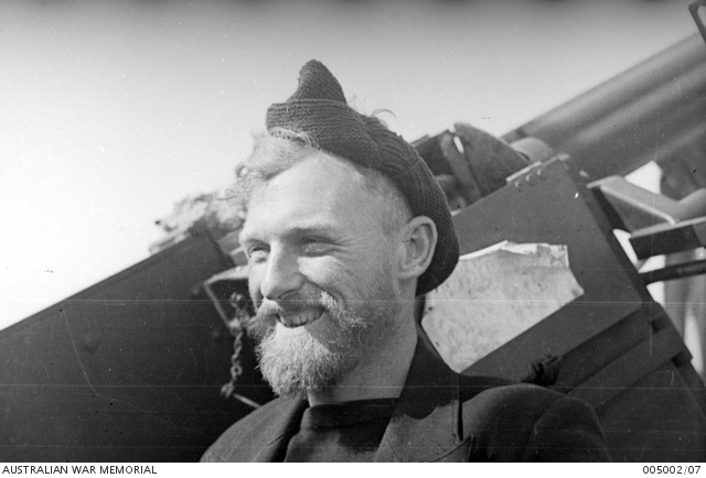 Off Bardia. Portrait of a happy sailor aboard HMS Ladybird ...