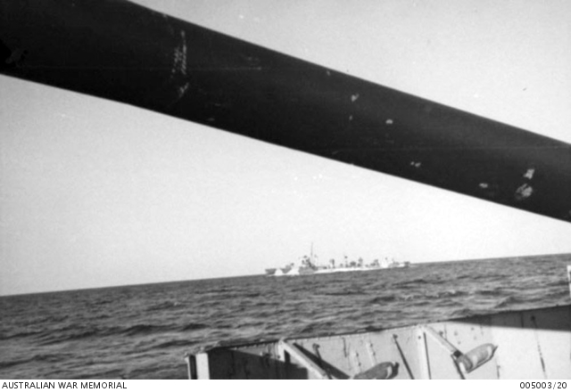 Seen from HMS Ladybird, a Royal Navy destroyer keeps watch for any ...