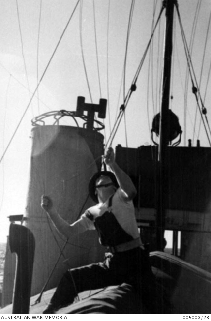 A rigger aboard a Royal Australian Navy destroyer engaged in the task ...