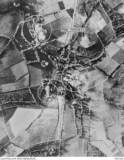 AERIAL PHOTO OF THE BOMBS EXPLODING AS THEY FIND THEIR MARK ...