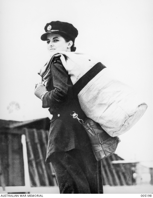 LONDON - A TYPICAL "WAAF", OR WOMEN OF THE AUXILIARY AIR FORCE GOES TO ...