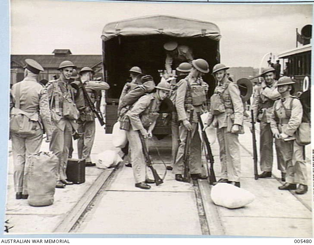 SYDNEY, NSW. MEMBERS OF THE 8TH DIVISION HEADQUARTERS WAITING TO BOARD ...