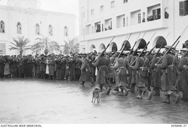 Infantry troops of the 6th Division entering the civic square of ...