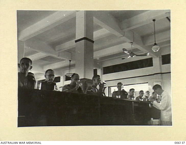 MALAYA. WITH THEIR BERETS TUCKED INTO THEIR SHOULDER STRAPS TROOPS ...