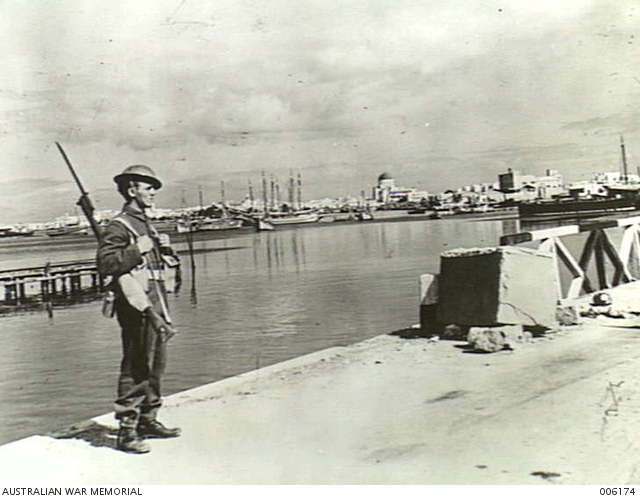 A BRITISH SENTRY ON GUARD AT BENGHAZI. | Australian War Memorial