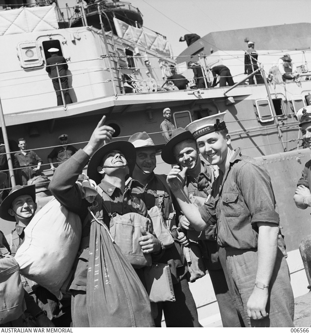 SAILORS MEET DIGGERS AFTER LONG MONTHS APART. TROOPS ARE EMBARKING ON ...