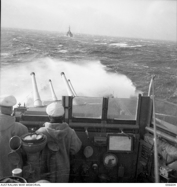 HMAS PERTH THRUSTING THROUGH ROUGH SEAS. | Australian War Memorial