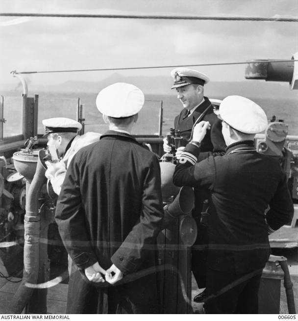 FOUR RN CREW MEMBERS ON THE BRIDGE OF HMAS PERTH. LEFT TO RIGHT ...