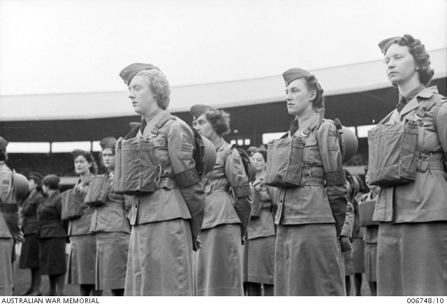 A group of members of the Australian Women's Legion wearing their gas ...