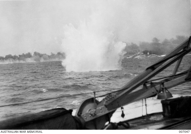 THE BATTLE OF MATAPAN. WATER SPURTS SKYWARDS, AS AN ENEMY SHOT FALLS ...