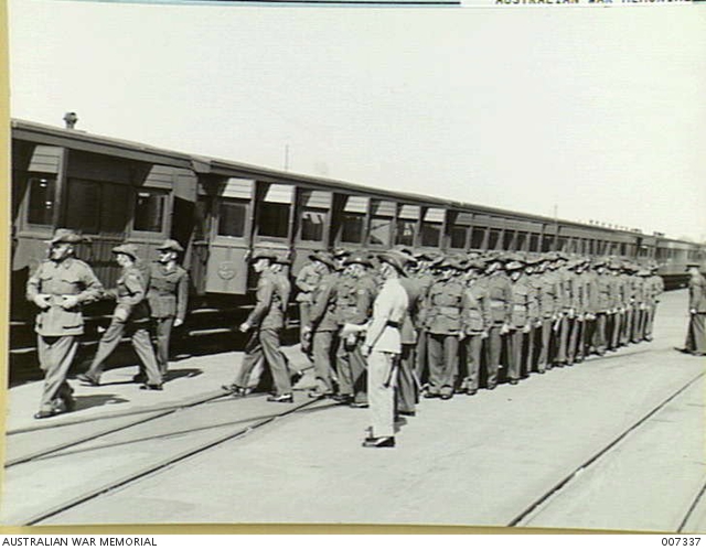 MEMBERS OF THE 2/11TH BATTALION BOARDING THE TRAIN FOR PERTH FOR A DAY ...