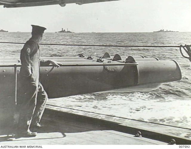 The watchful confidence of the Royal Navy is expressed in the ttitude ...