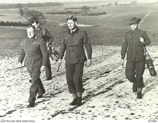 C.O. COLONEL MOORE AND CAPTAIN CUTTUM ON THE GOLF COURSE. (NEGATIVE BY ...