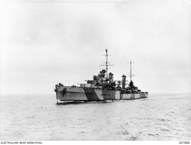 Port bow view of the cruiser HMAS Sydney. She is wearing the camouflage ...