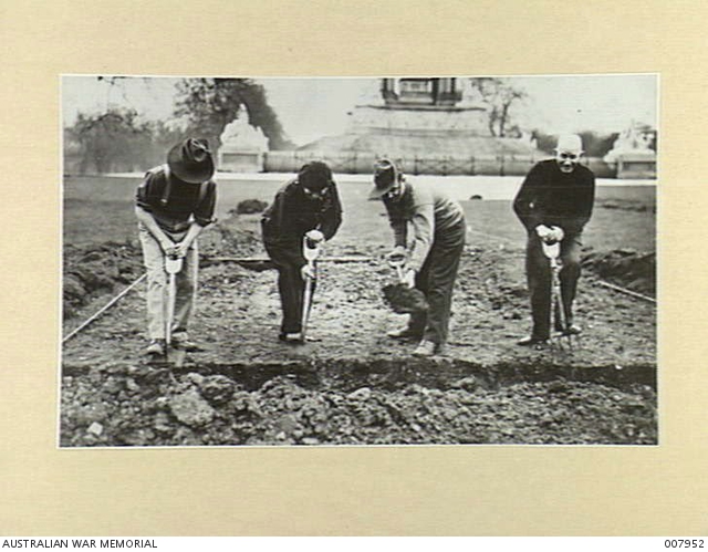 LONDON ENGLAND. STAFF SERGEANT G. MUMMERY, L. GAUNT (ARP WARDEN ...