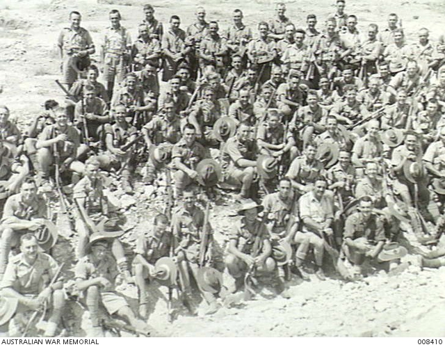Australian soldiers of B Company, 2/27th Battalion, AIF, resting during ...