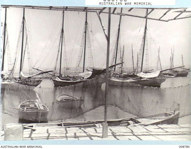 SYRIA. FISHING BOATS AND FISHING NETS IN THE HARBOUR OF TYRE, ONCE BUSY ...